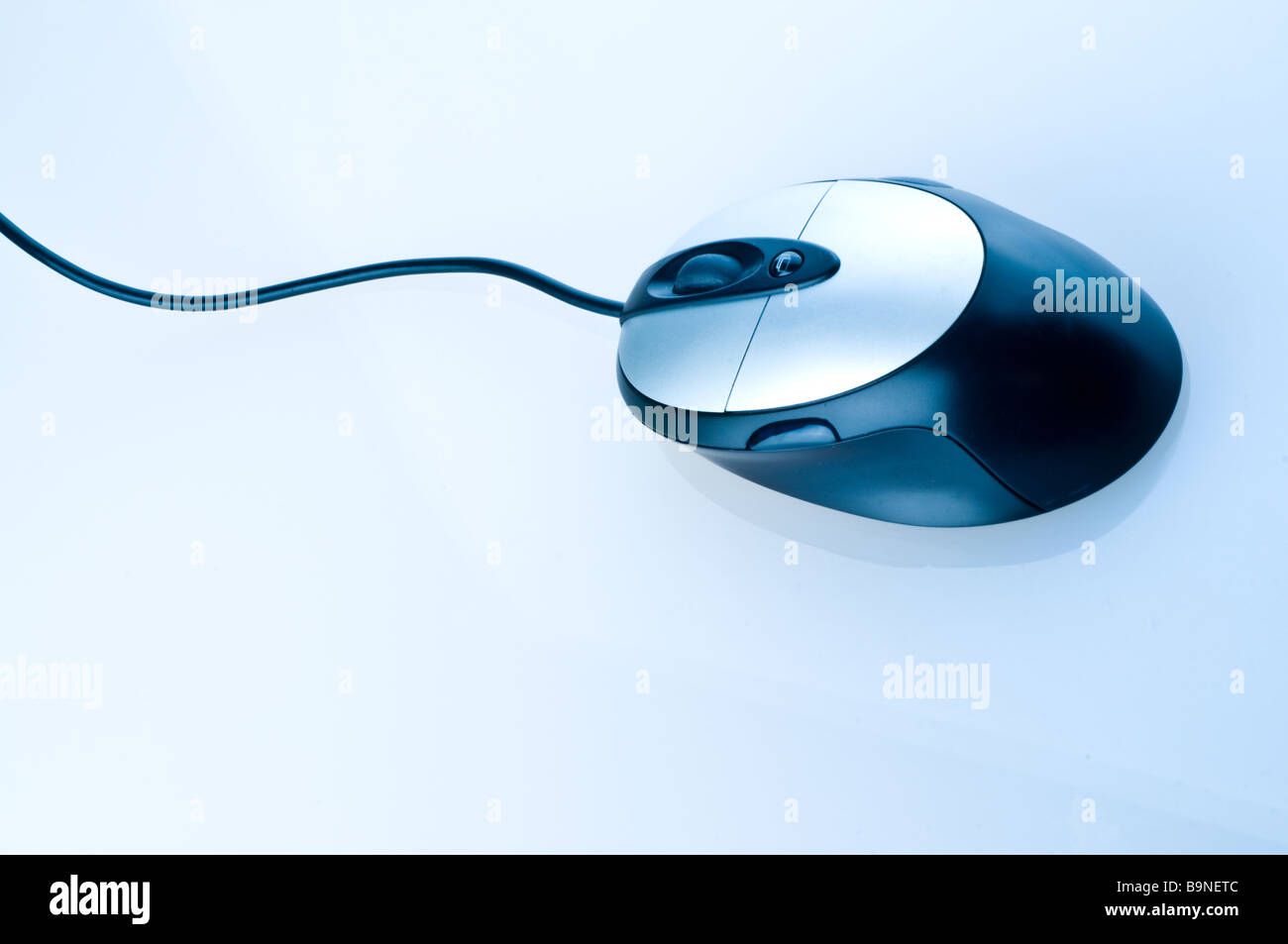 computer mouse with cable on background Stock Photo - Alamy