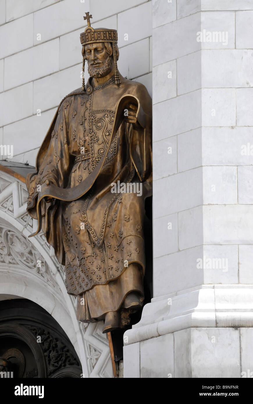 Bronze figure of Saint above the entrance in the cathedral of Christ ...