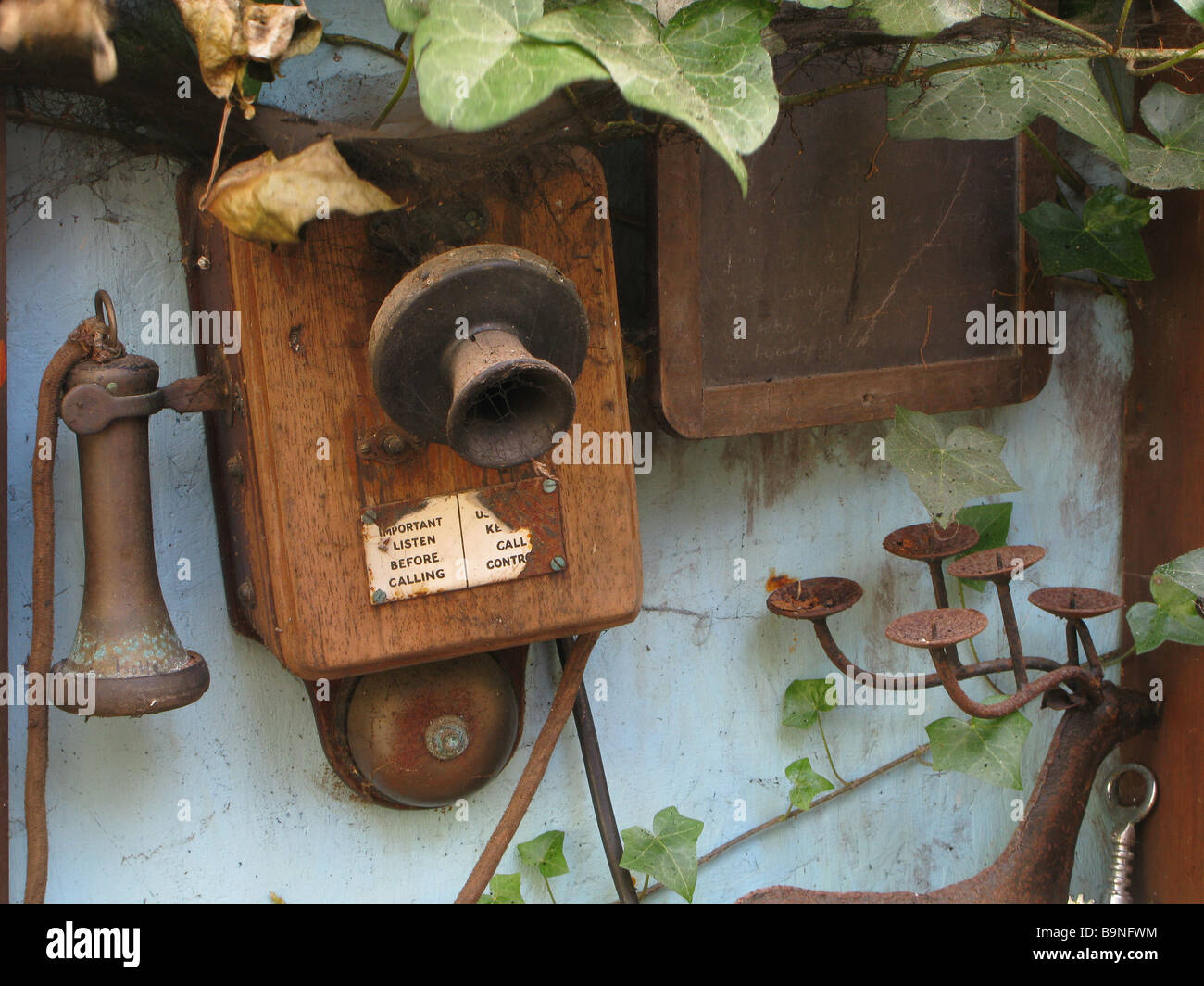 old walled-mounted phone in garden shed Stock Photo - Alamy