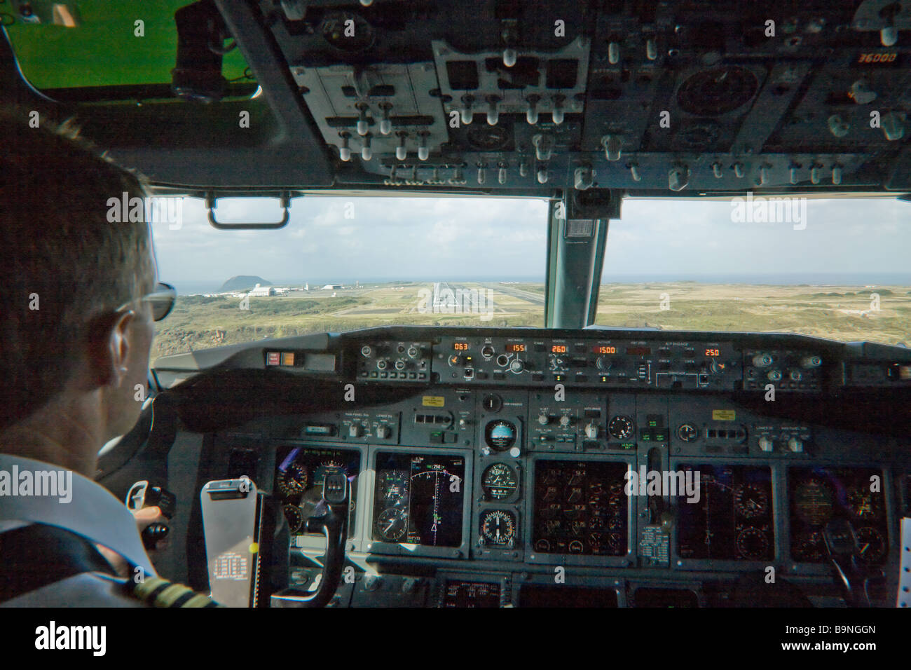 In the cockpit of a 737 aircraft on final approach to Iwo Jima airport ...