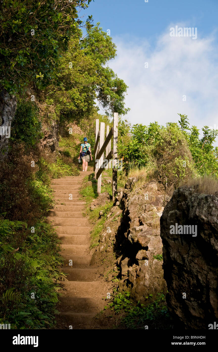 Hiker walks the Pali Trail, Kalaupapa National Historical Park ...