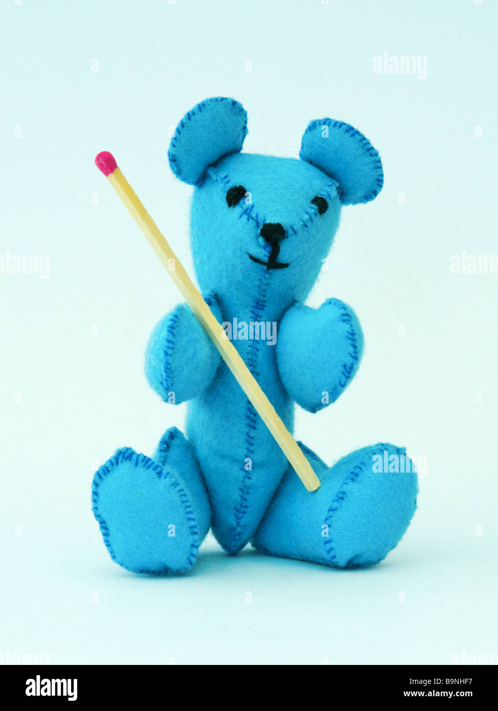 Miniature teddy playing with matches (Mini Bear Collection Stock Photo ...