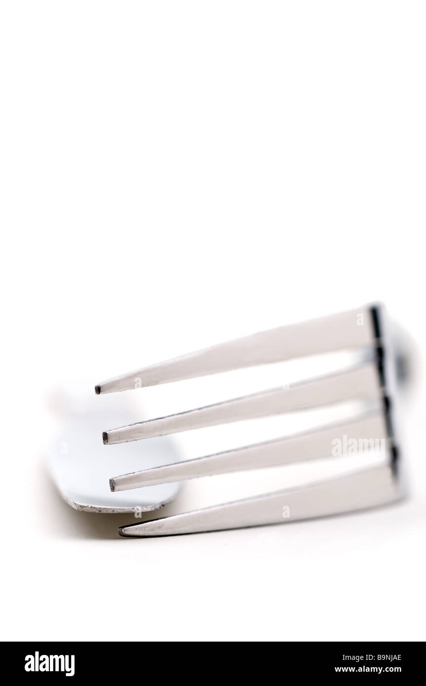 Shallow focus extreme closeup of a knife and fork Stock Photo - Alamy