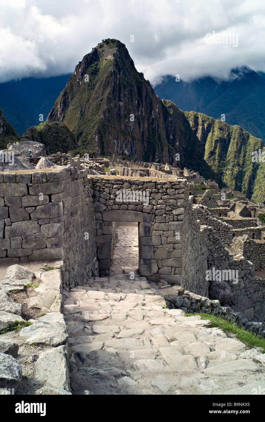 PERU MACHU PICCHU Main gate into the city of Machu Picchu with Huayna ...
