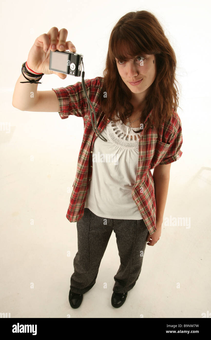 Girl taking self portrait with camera Stock Photo - Alamy