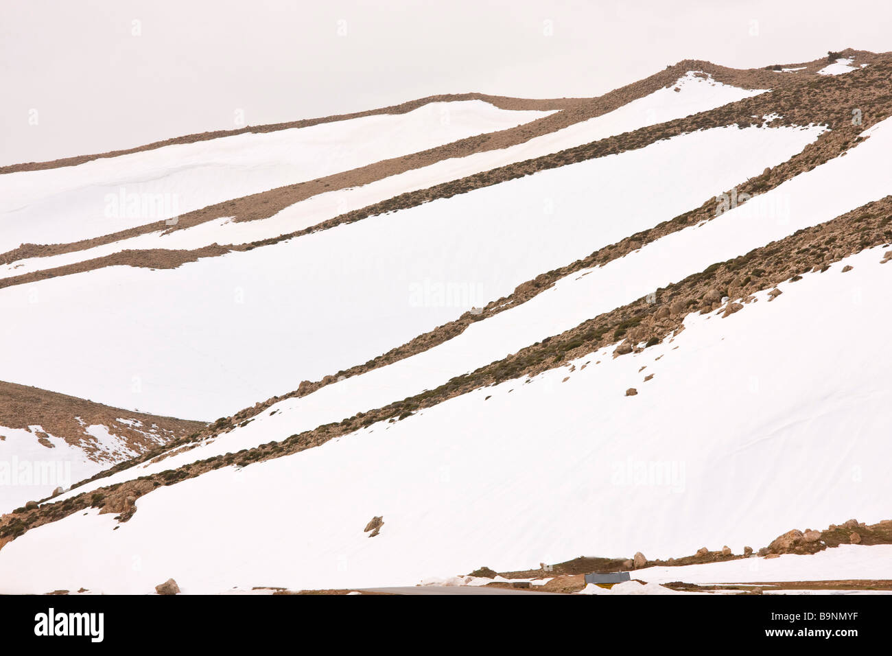 Snowy mountain ridges in winter in the Middle Atlas Mountains Morocco ...