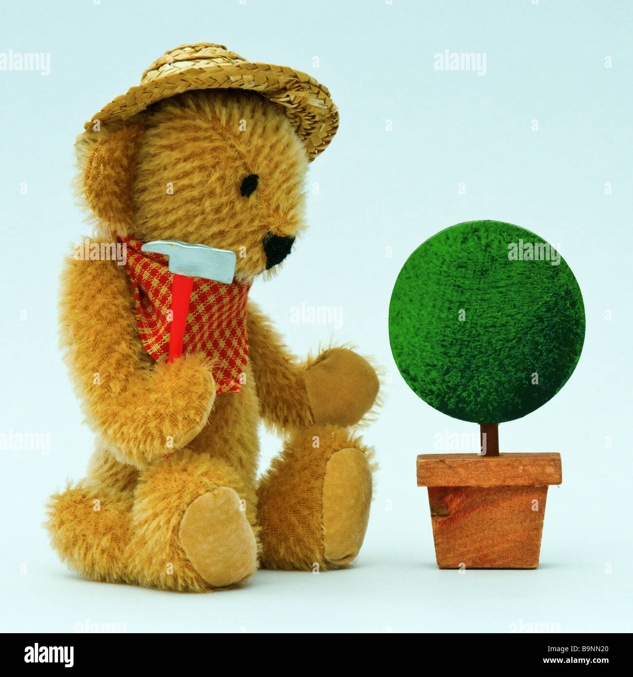 Miniature teddy choping down a tree (Mini Bear Collection Stock Photo ...