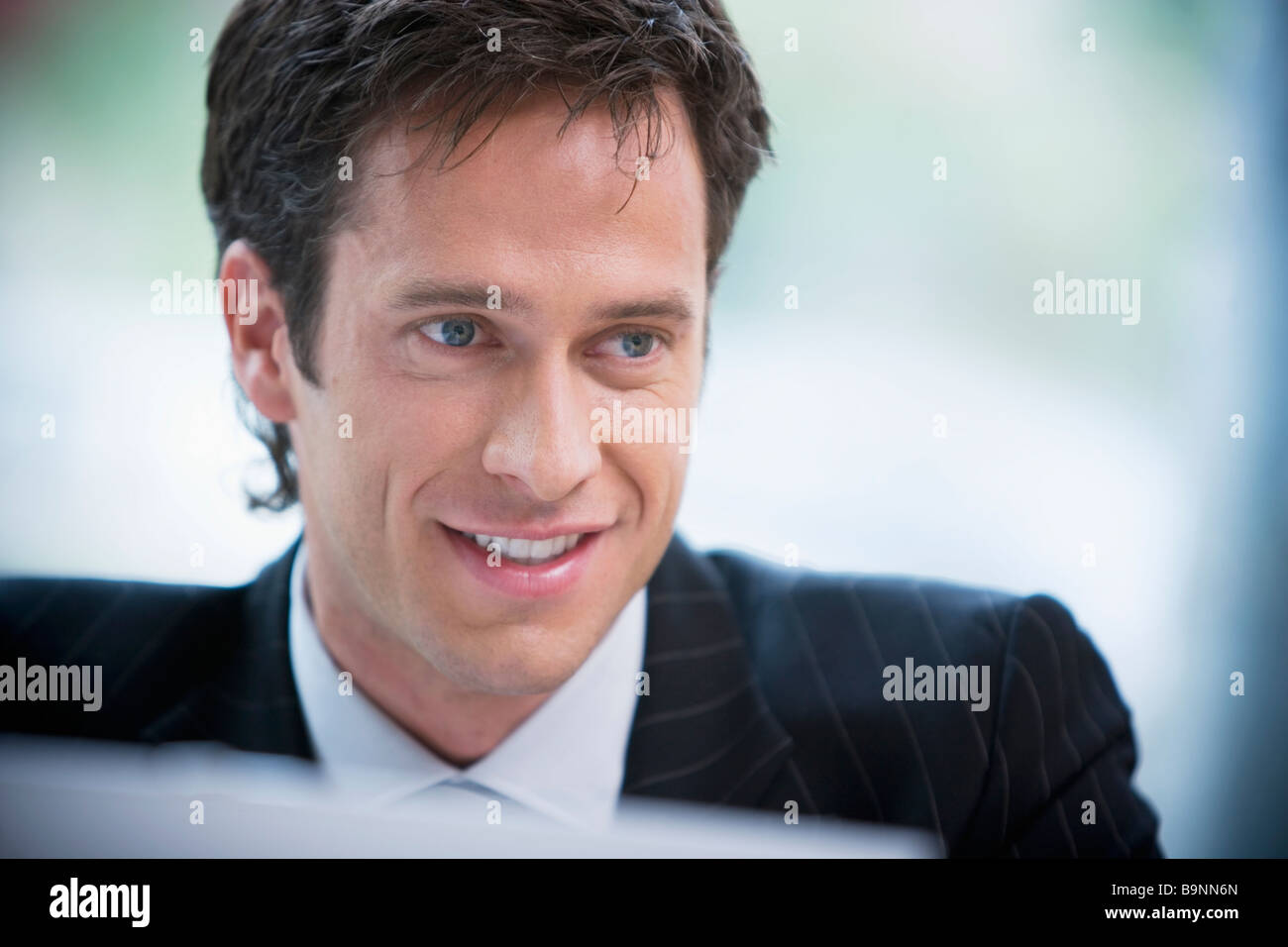 headshot of businessman thinking Stock Photo - Alamy