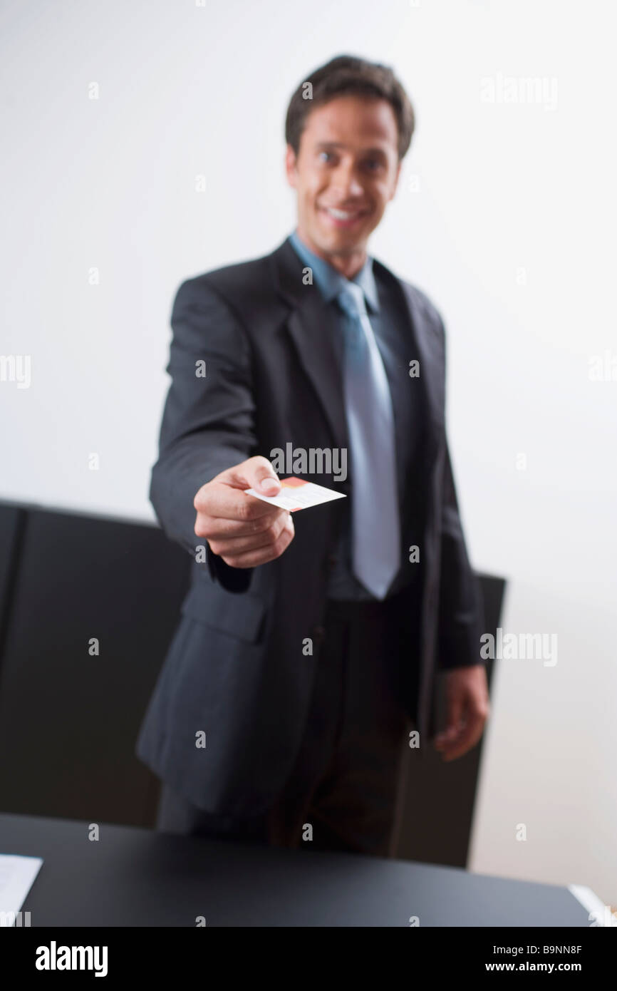 Person holding out business card hi-res stock photography and images ...