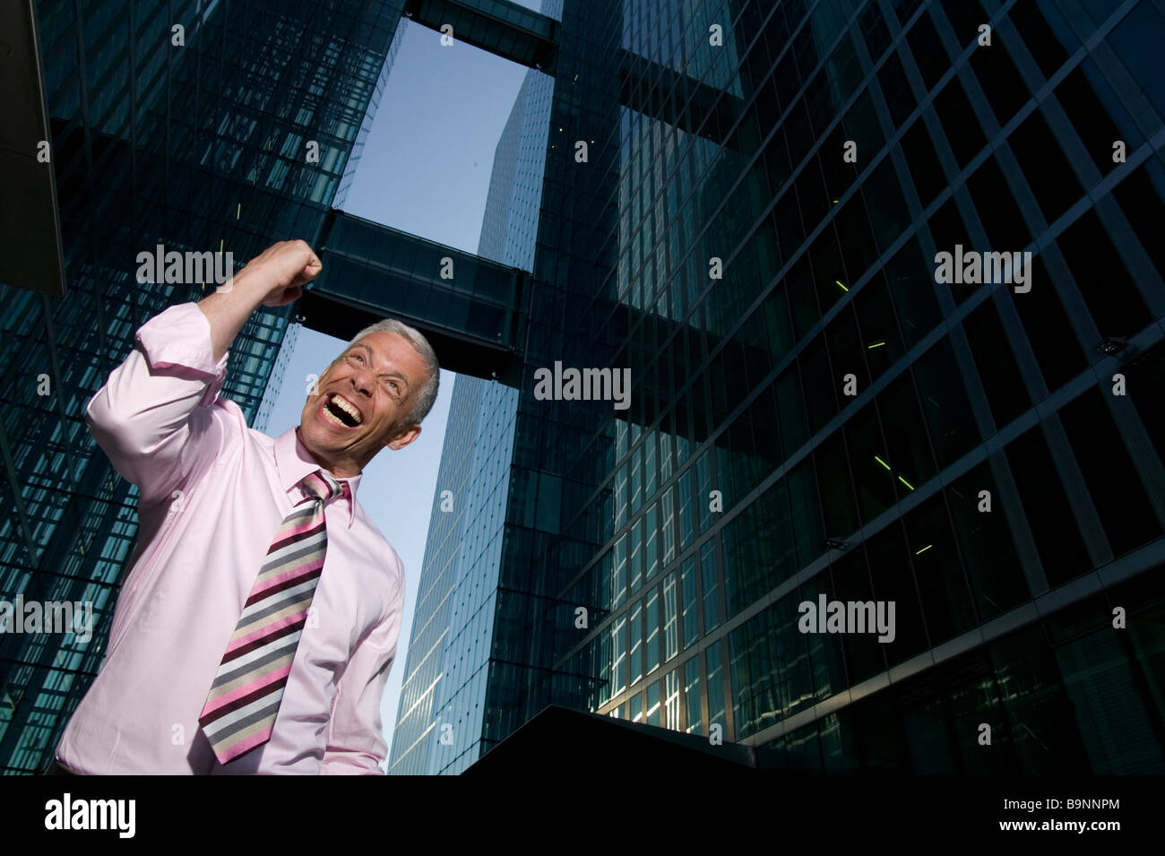 Portrait grey hair businessman celebrating hi-res stock photography and ...