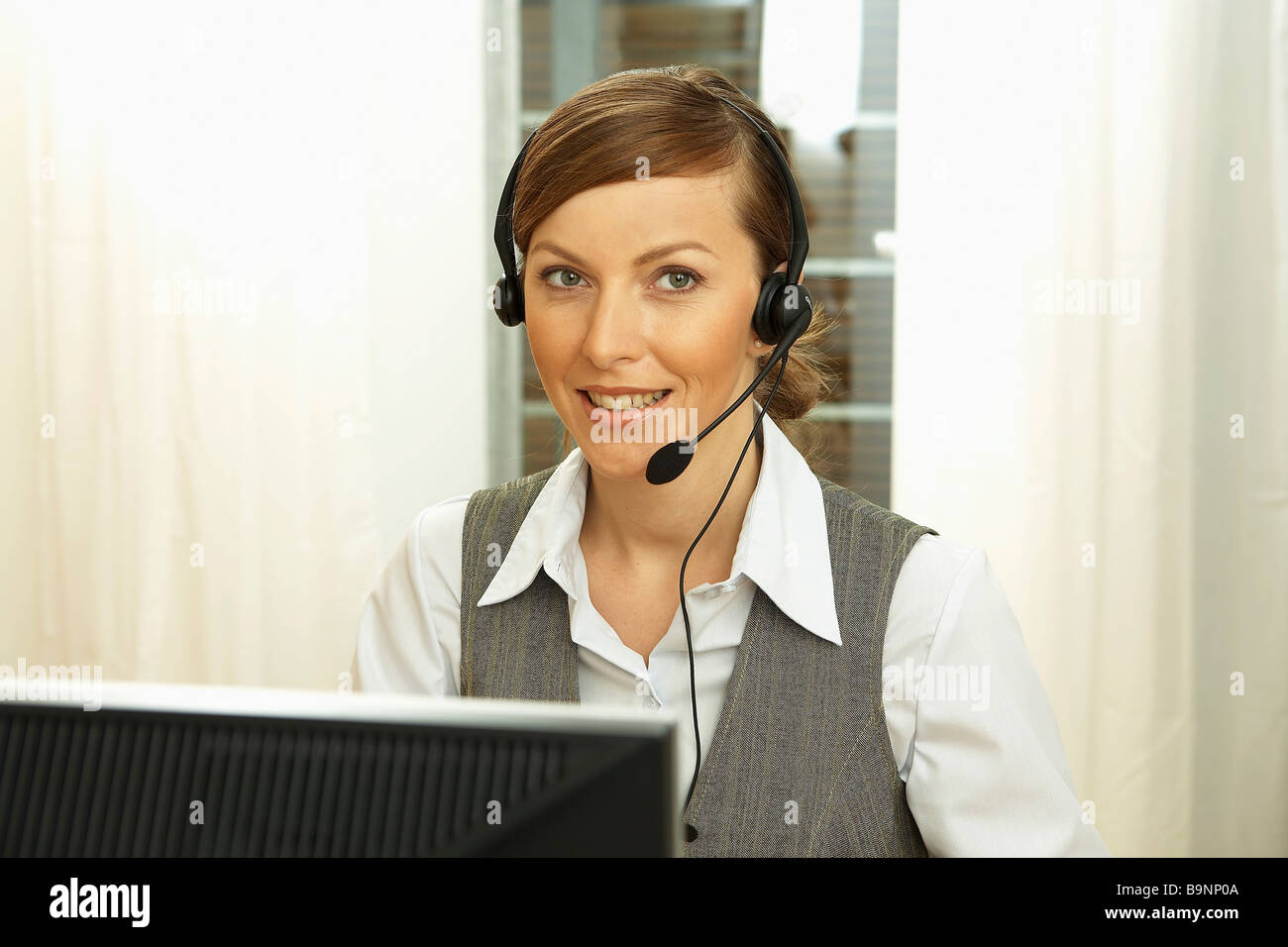 portrait of female call center agent Stock Photo - Alamy