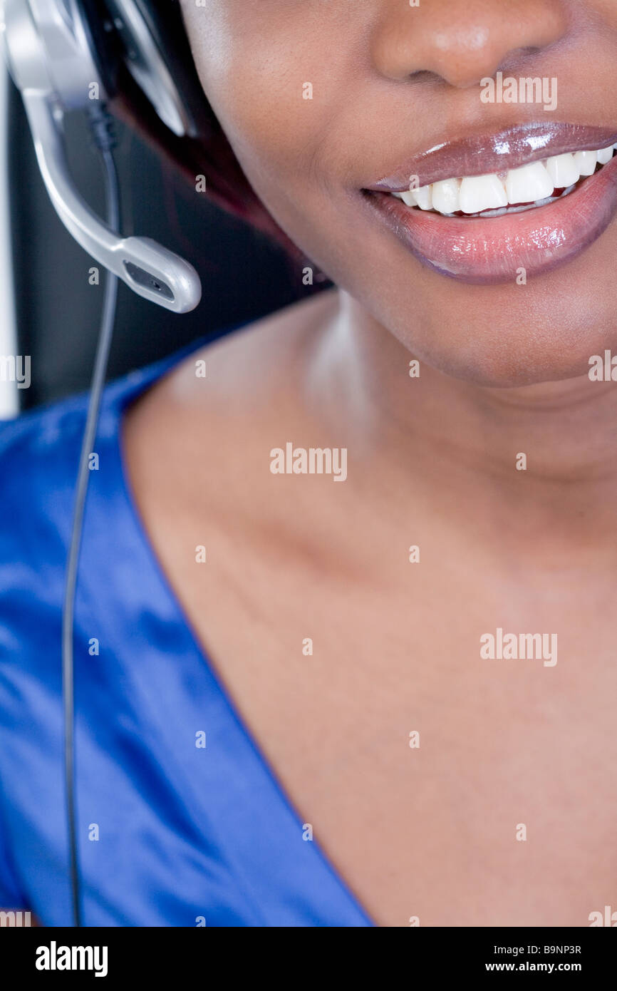 detail of black call center agent with headset Stock Photo - Alamy