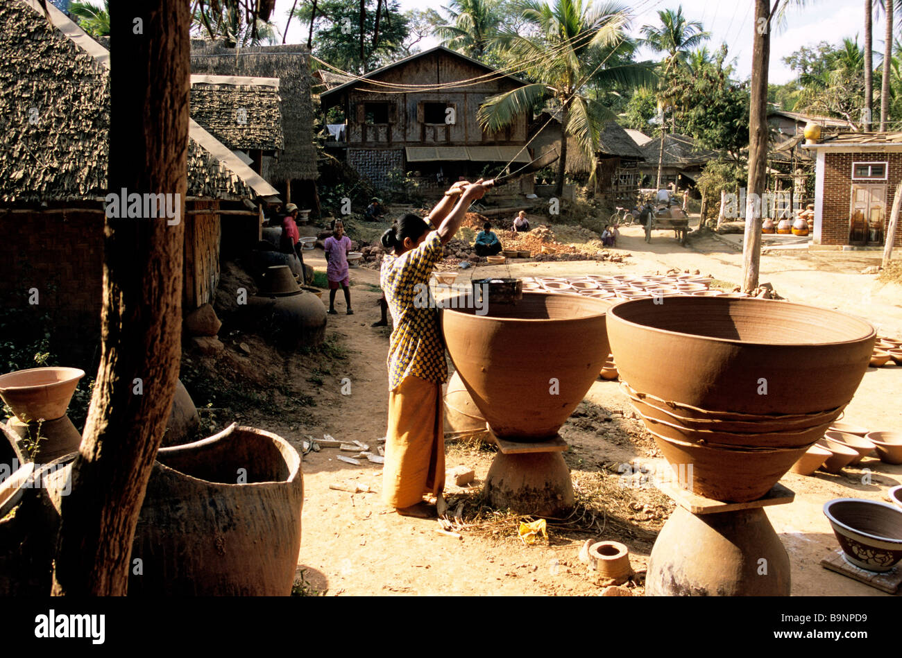 Myanmar (Burma), pots drying in a potters' village on Irrawaddy River ...