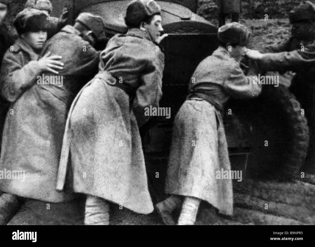 Red Army soldiers pulling the truck out of gutter during the Great ...