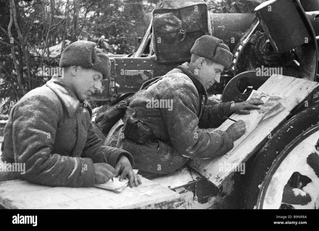 Editor Junior Sergeant Volvenkov right and soldier Bogachev working on ...