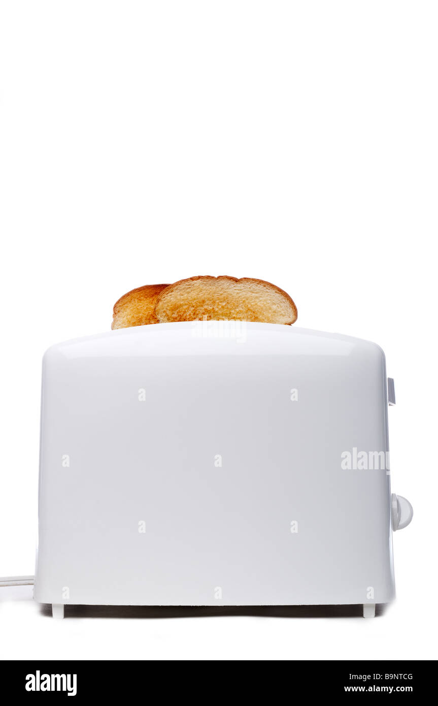 Toasted bread popping up from a white toaster Stock Photo - Alamy