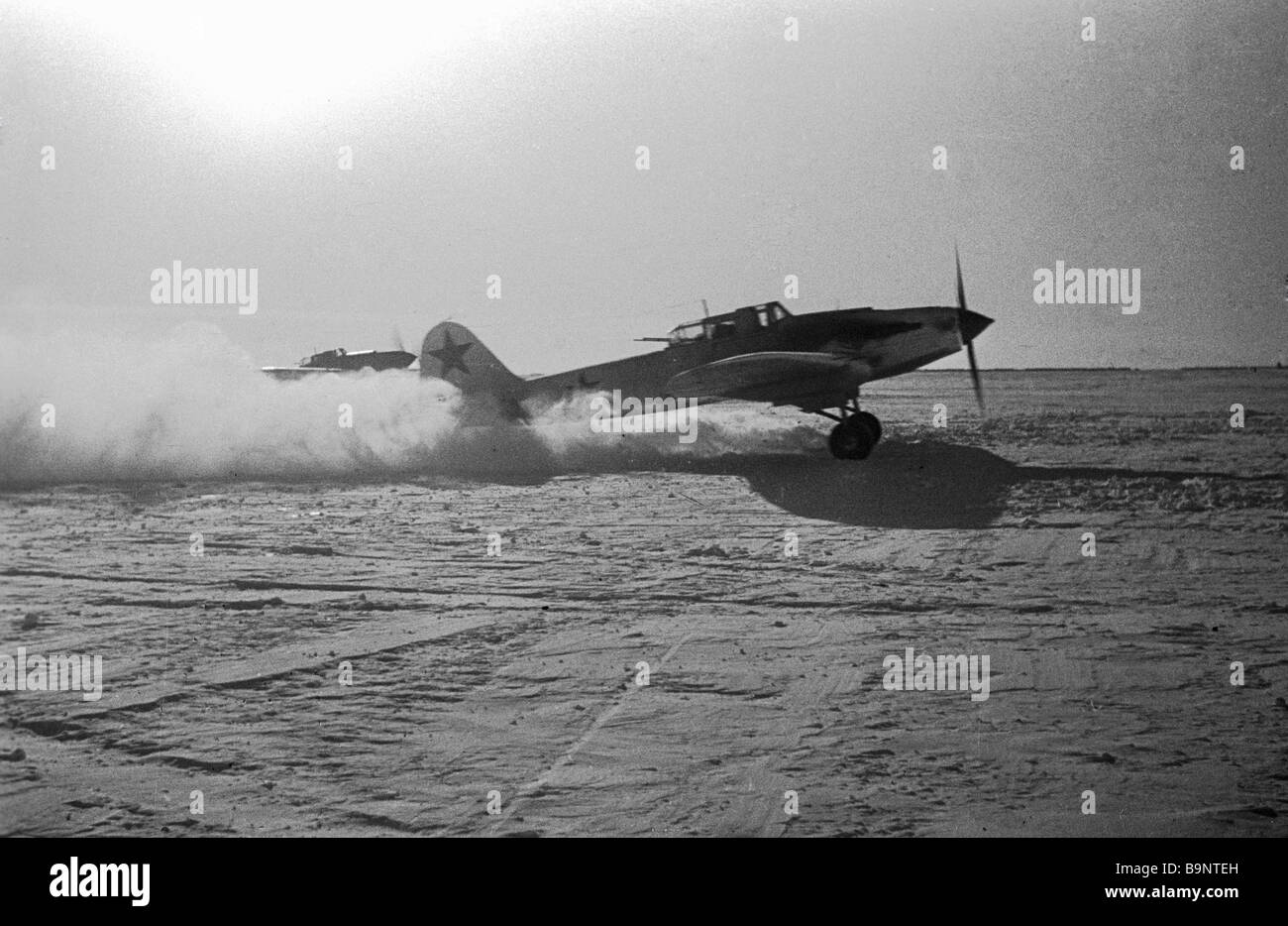 Soviet Il 2 attack fighter taking off a field Stock Photo - Alamy