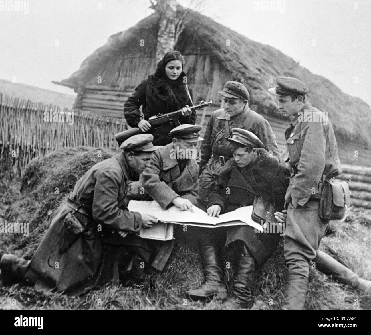 Guerrilla commanders of the Suvorov unit discussing a plan of actions ...