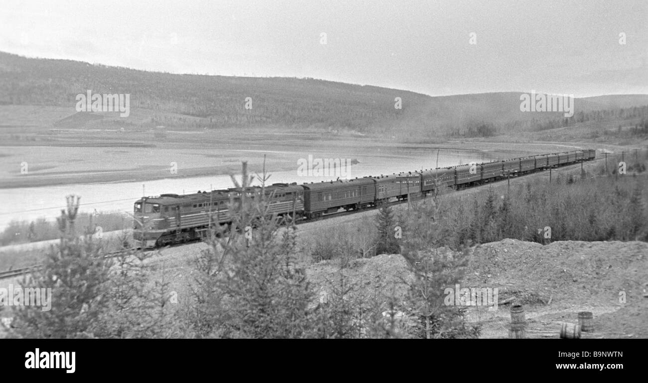 A train approaches Lena station Stock Photo - Alamy