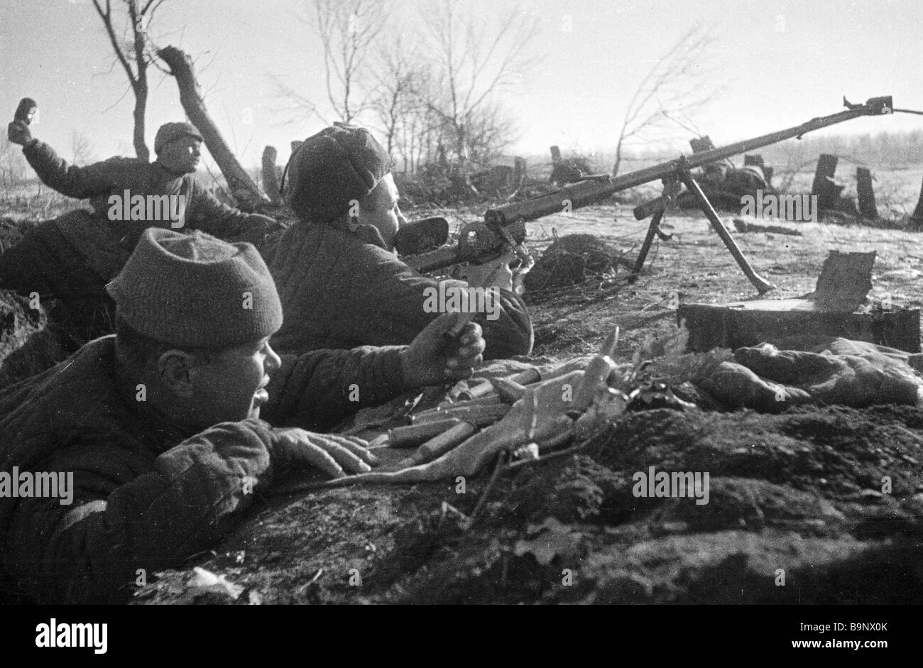 Soldiers fighting from a trench Stock Photo - Alamy
