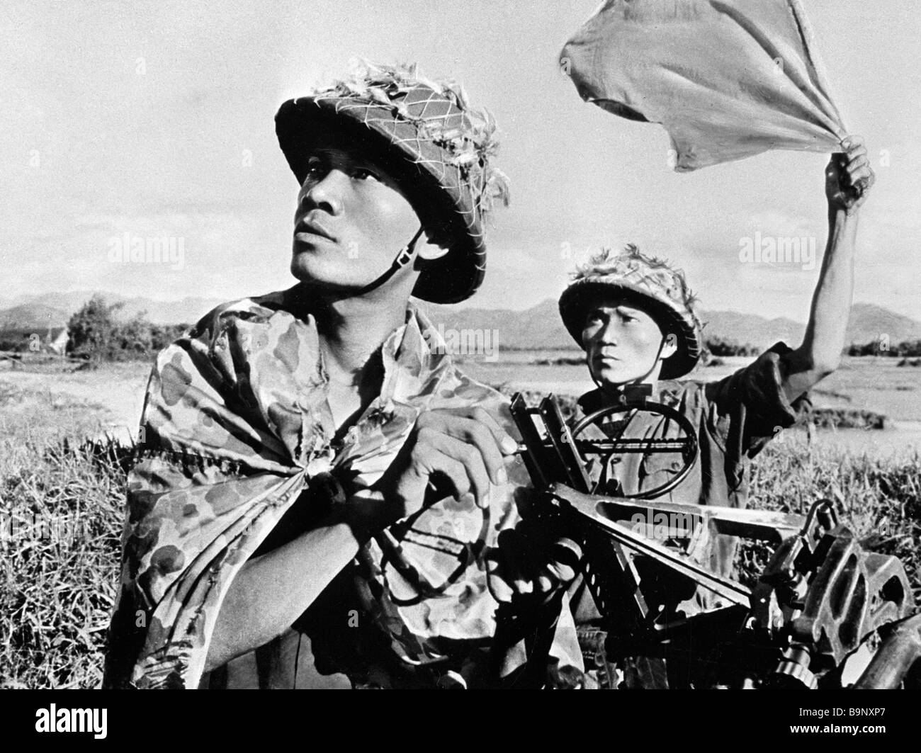 Vietnamese soldiers near an anti aircraft gun during American ...