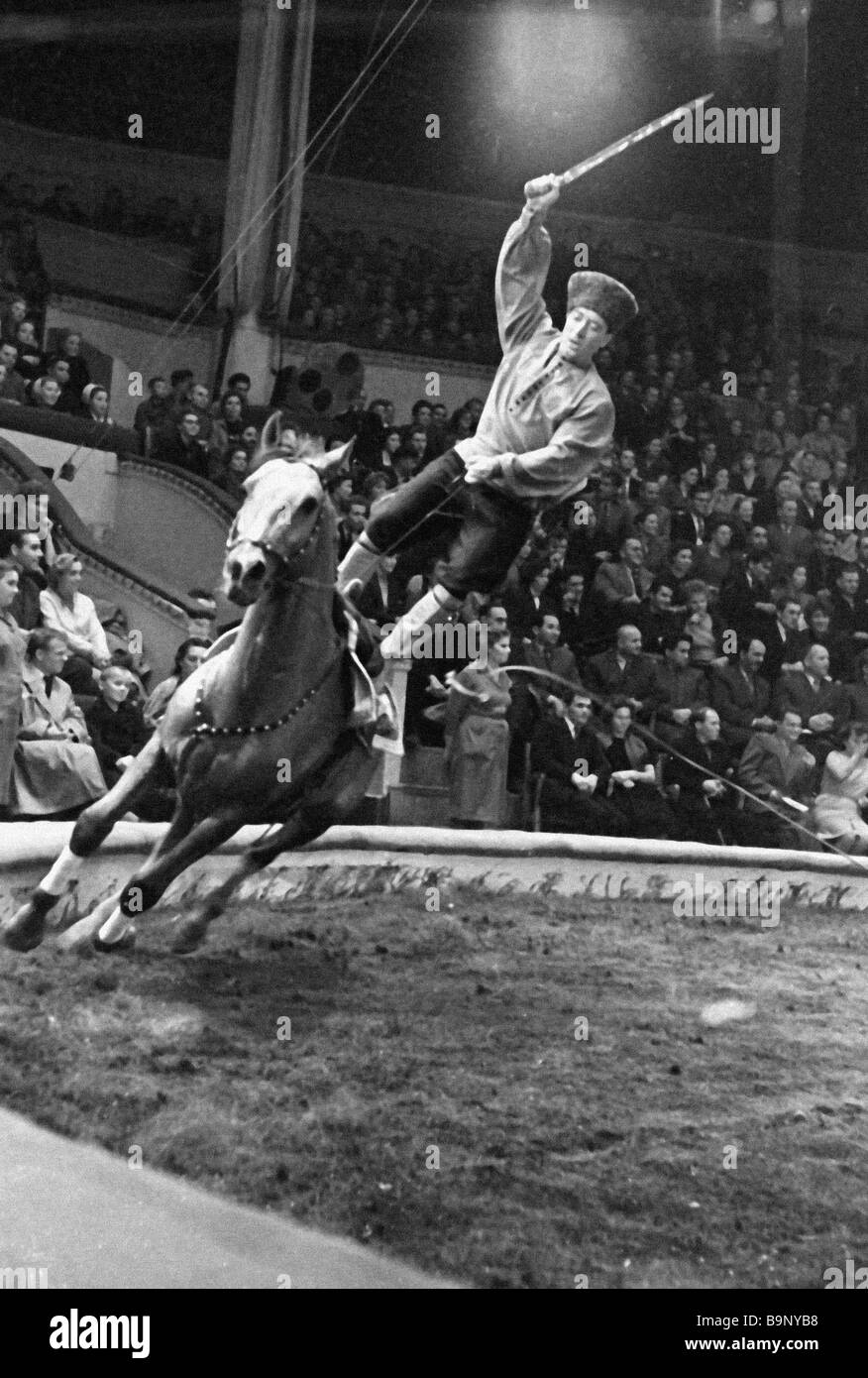 A horseman during his performance in the circus Stock Photo - Alamy