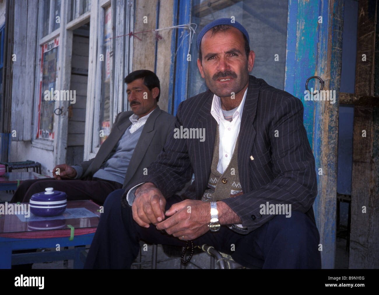 Turkish Kurd men sitting outside Kurdish tea house Turkey Stock Photo ...