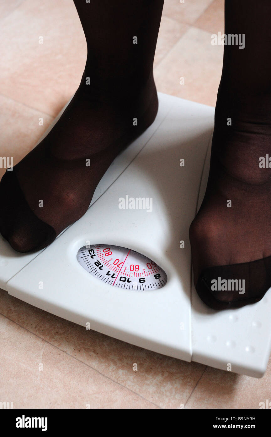 Obesity Woman Scales High Resolution Stock Photography and Images - Alamy