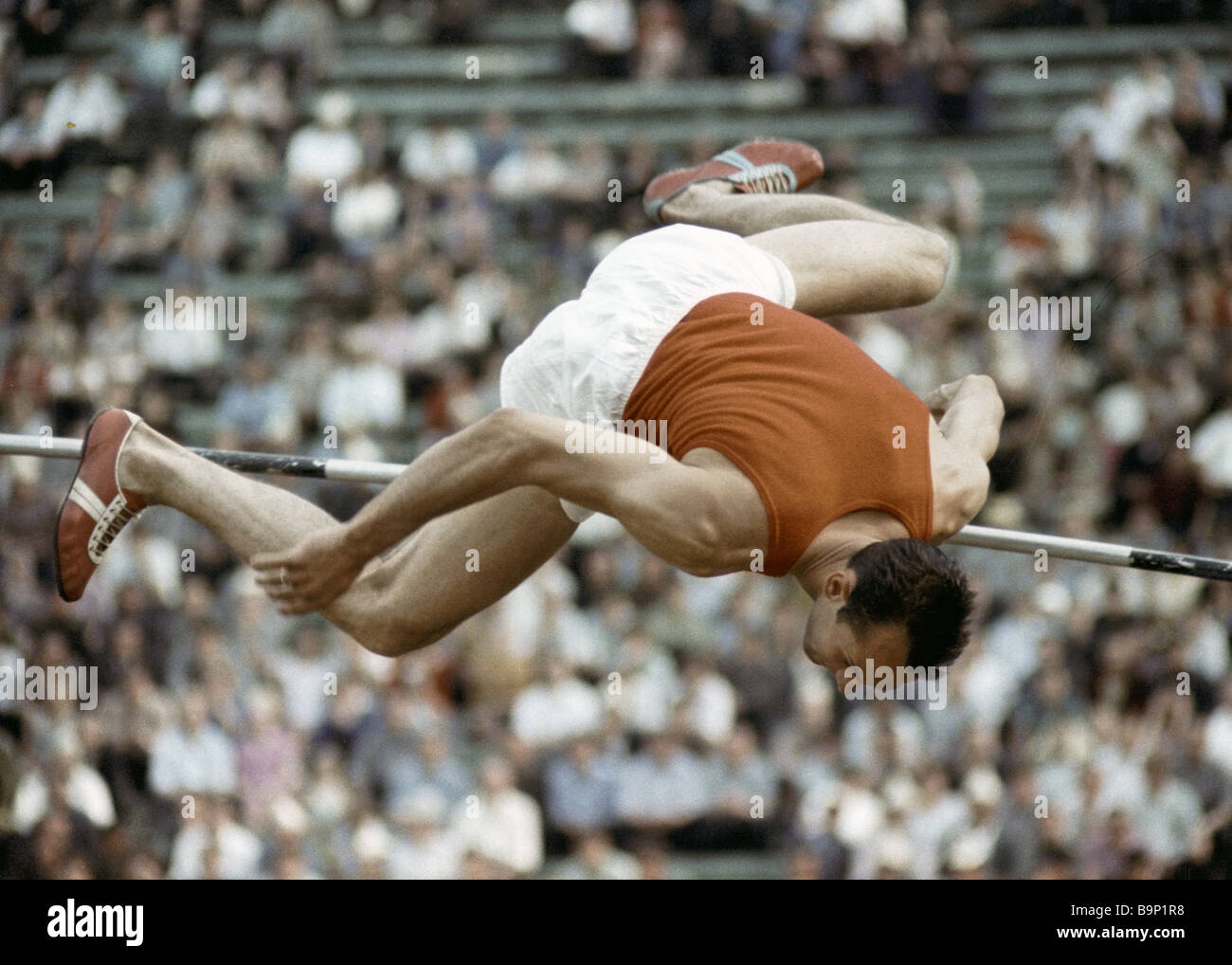 Track and field athlete Valery Brumel high jumps at stadium Stock Photo ...