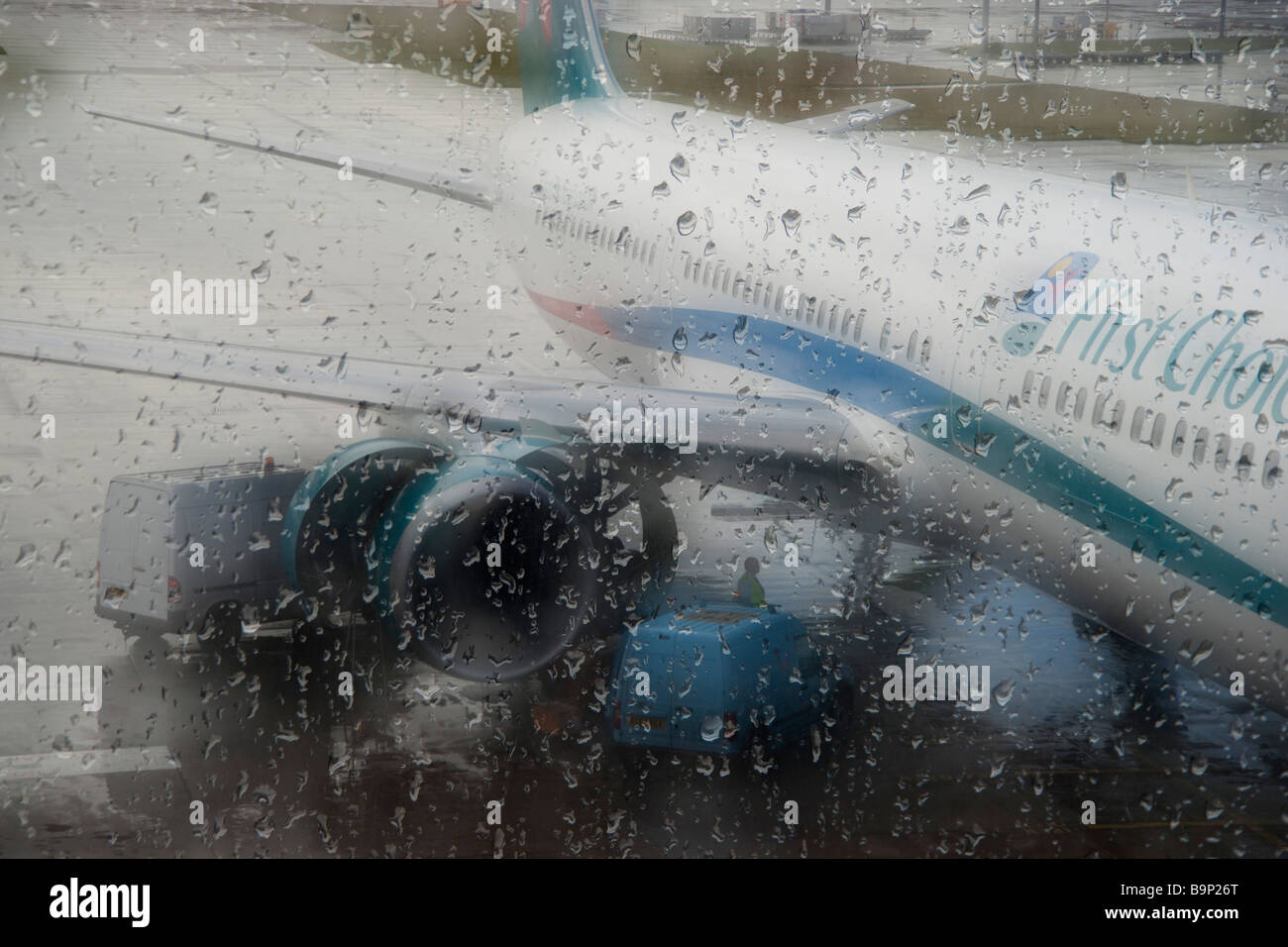 Manchester Airport UK rainy day and flight to the sun but the flight is ...