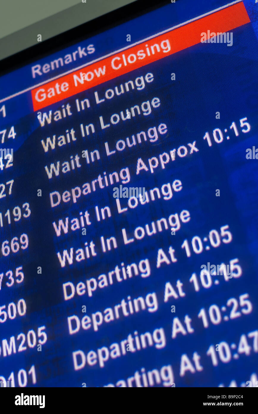 Manchester Airport UK departure announcement screen Stock Photo - Alamy