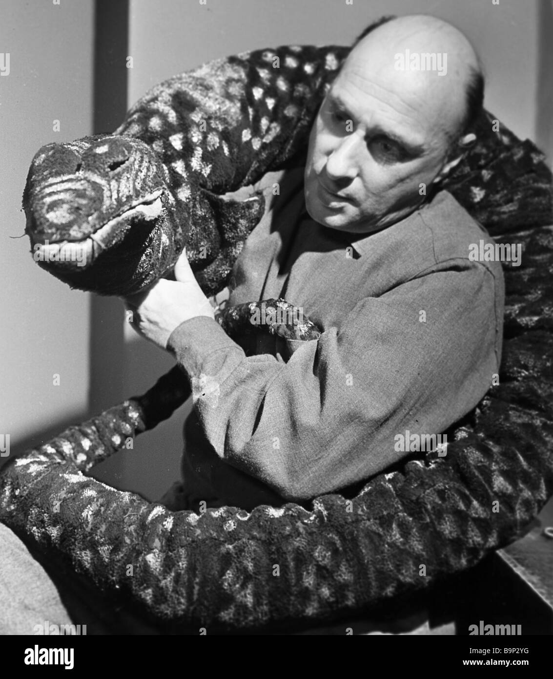 Ivan Samodur Distinguished Artist of the R S F S R with the puppet Kaa ...