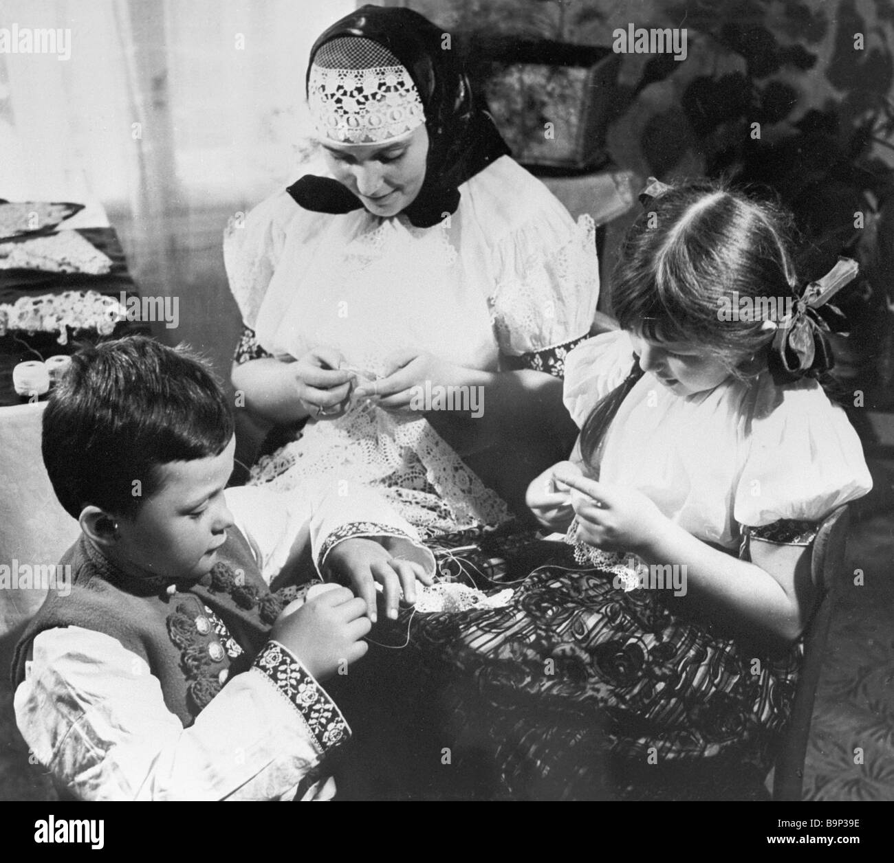 Children learning to make laces Stock Photo - Alamy