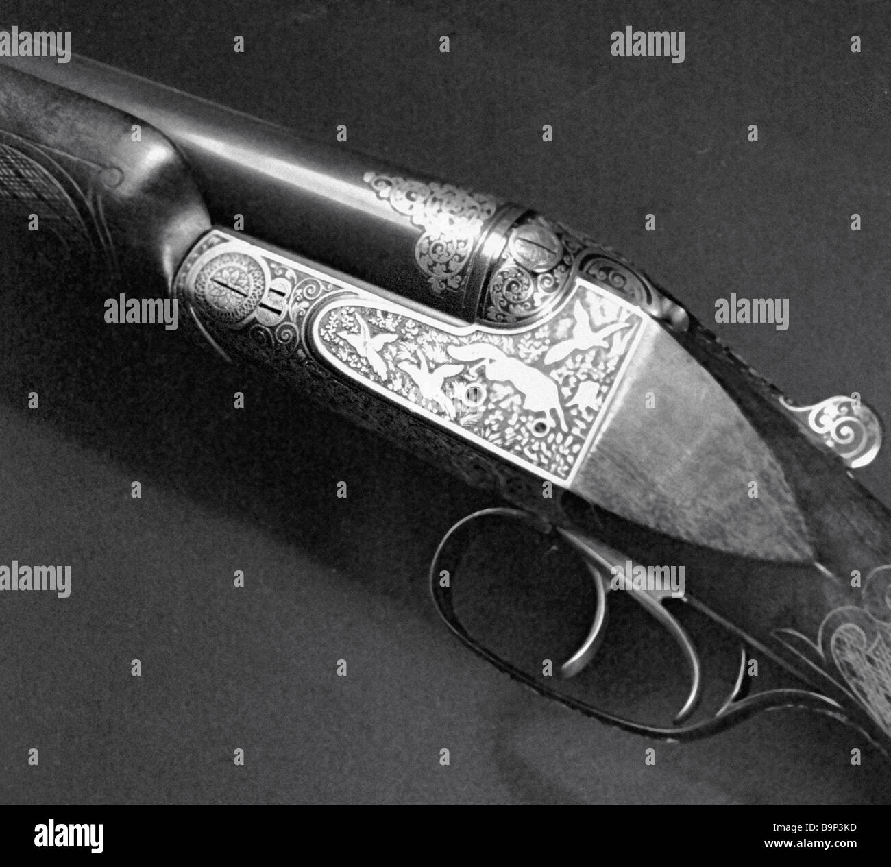 A gold and silver decorated rifle made by Izhevsk craftsmen Stock Photo ...