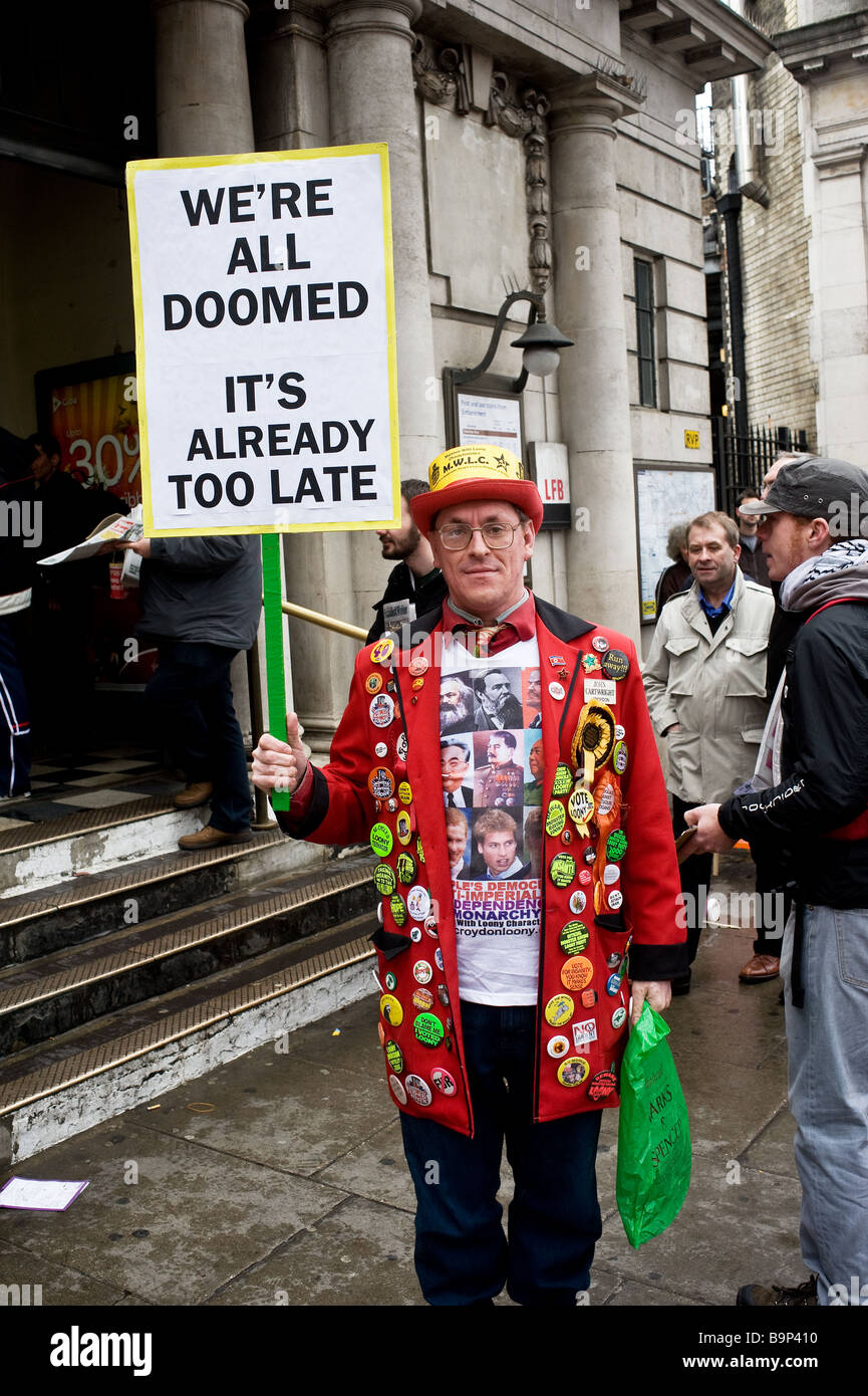 John Cartwright of the Monster Raving Loony Party carrying a placard at ...