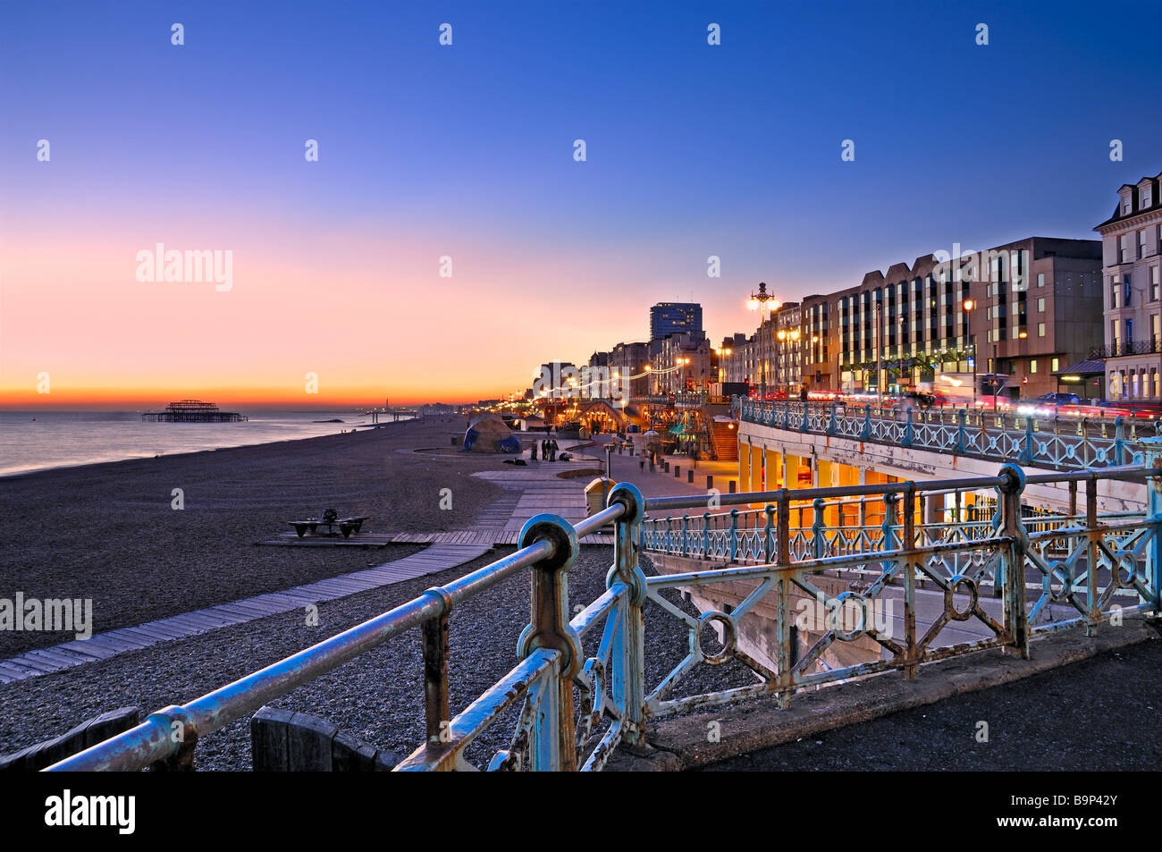 dusk sunset showing beach and promenade brighton seaside coastal town ...