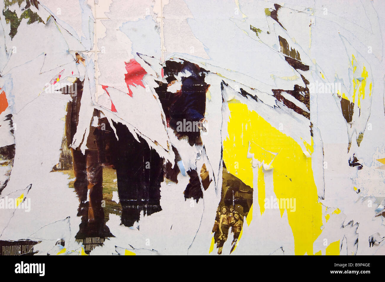 abstract shot of ripped paper adverts on advertising board Stock Photo ...