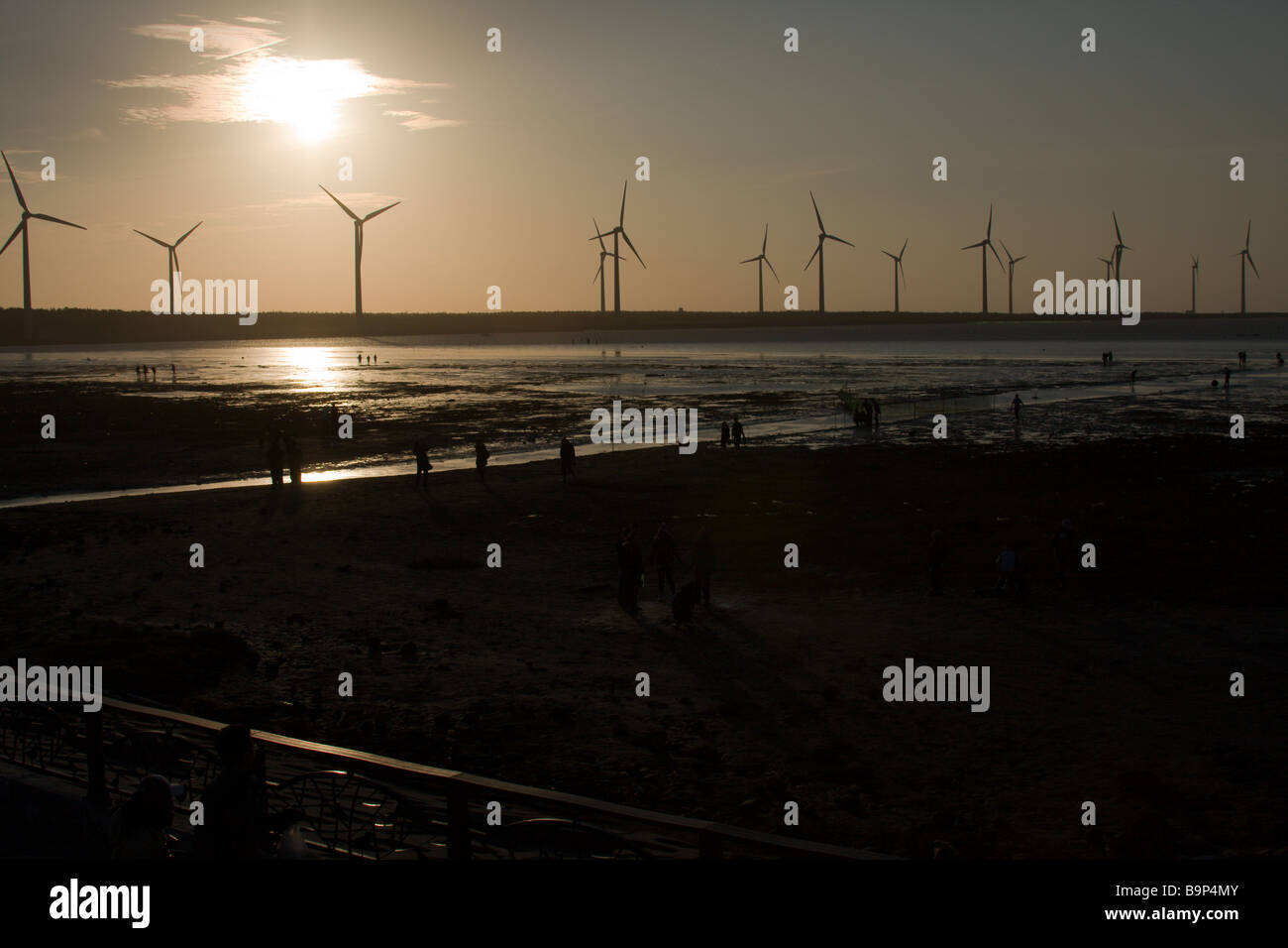 Wind farm silhouette during sunset, Gaomei Wetlands, Qingshui District ...