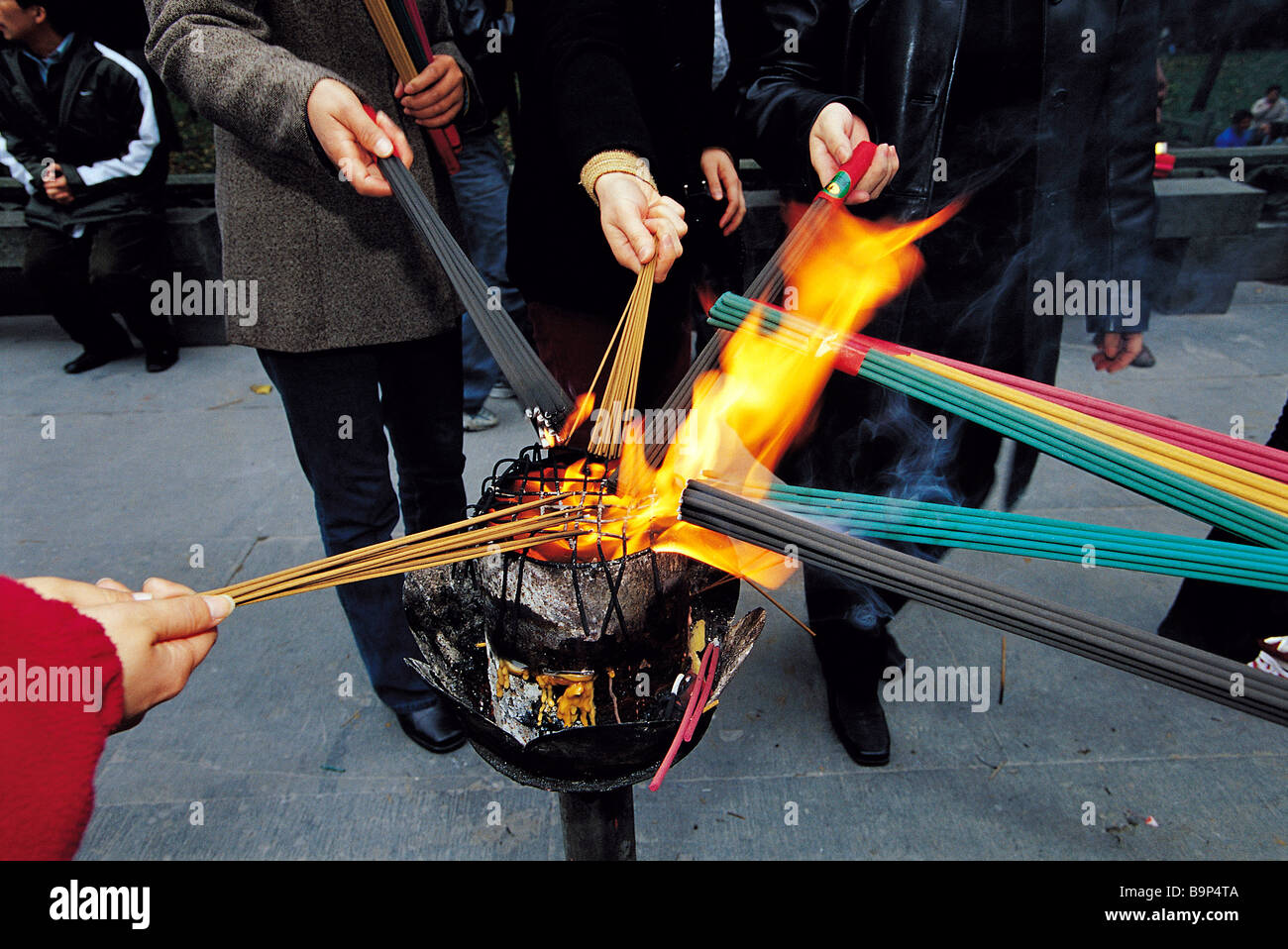 China, Hangzhou, Lin Ying temple, believers burning incense Stock Photo ...