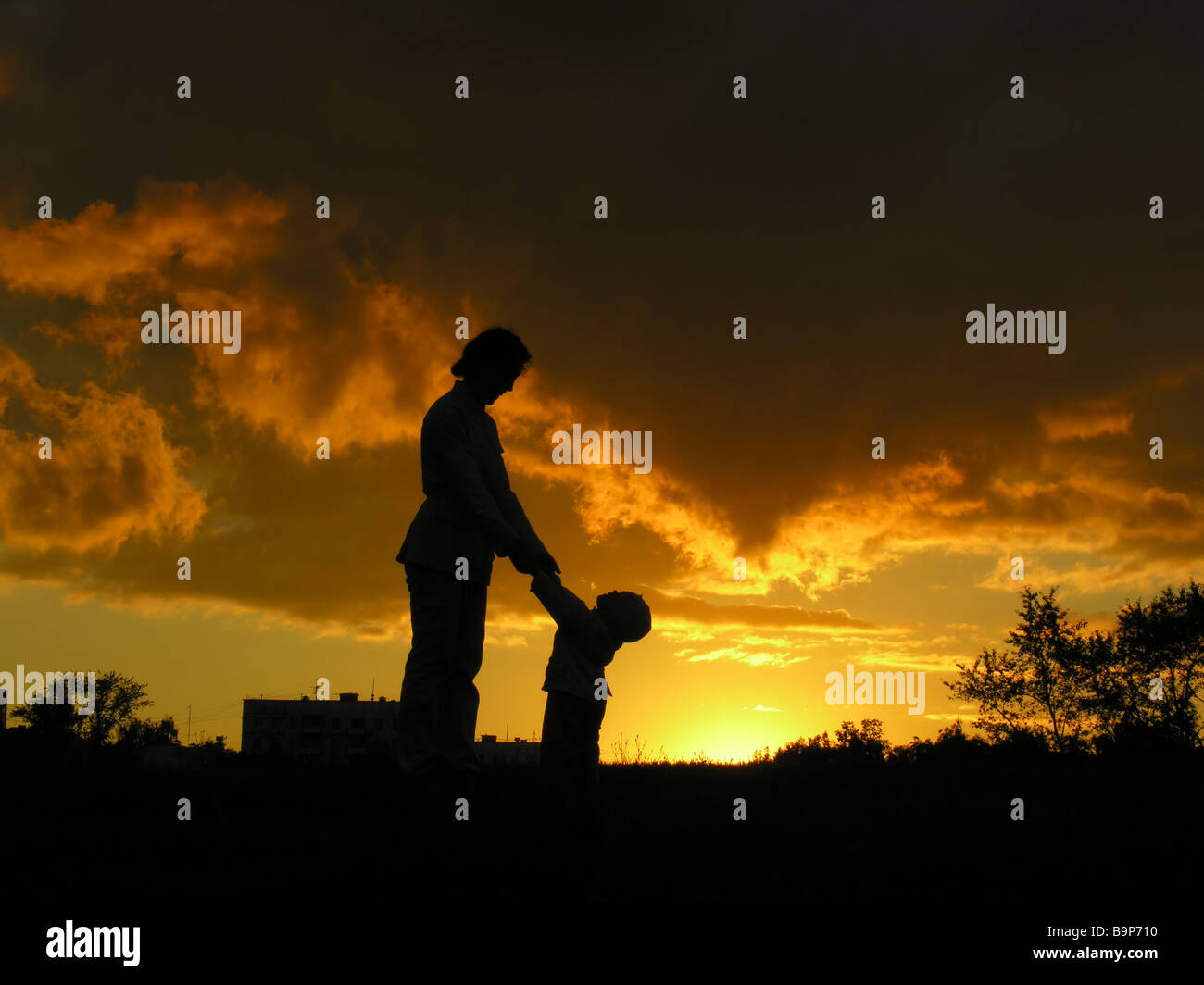 mother with baby sunset Stock Photo - Alamy
