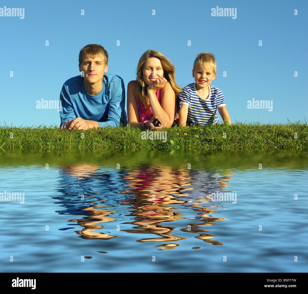 family with water Stock Photo - Alamy