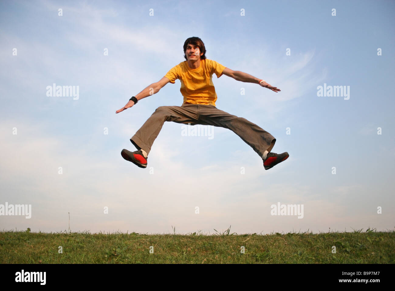 jump boy o meadow 2 Stock Photo - Alamy
