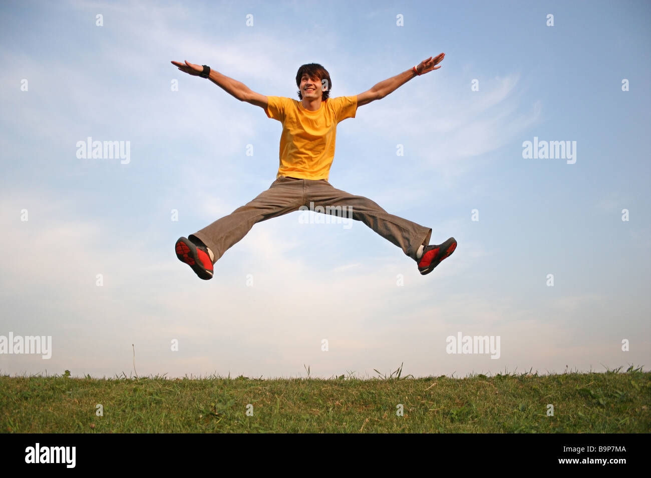 jump boy on meadow Stock Photo - Alamy