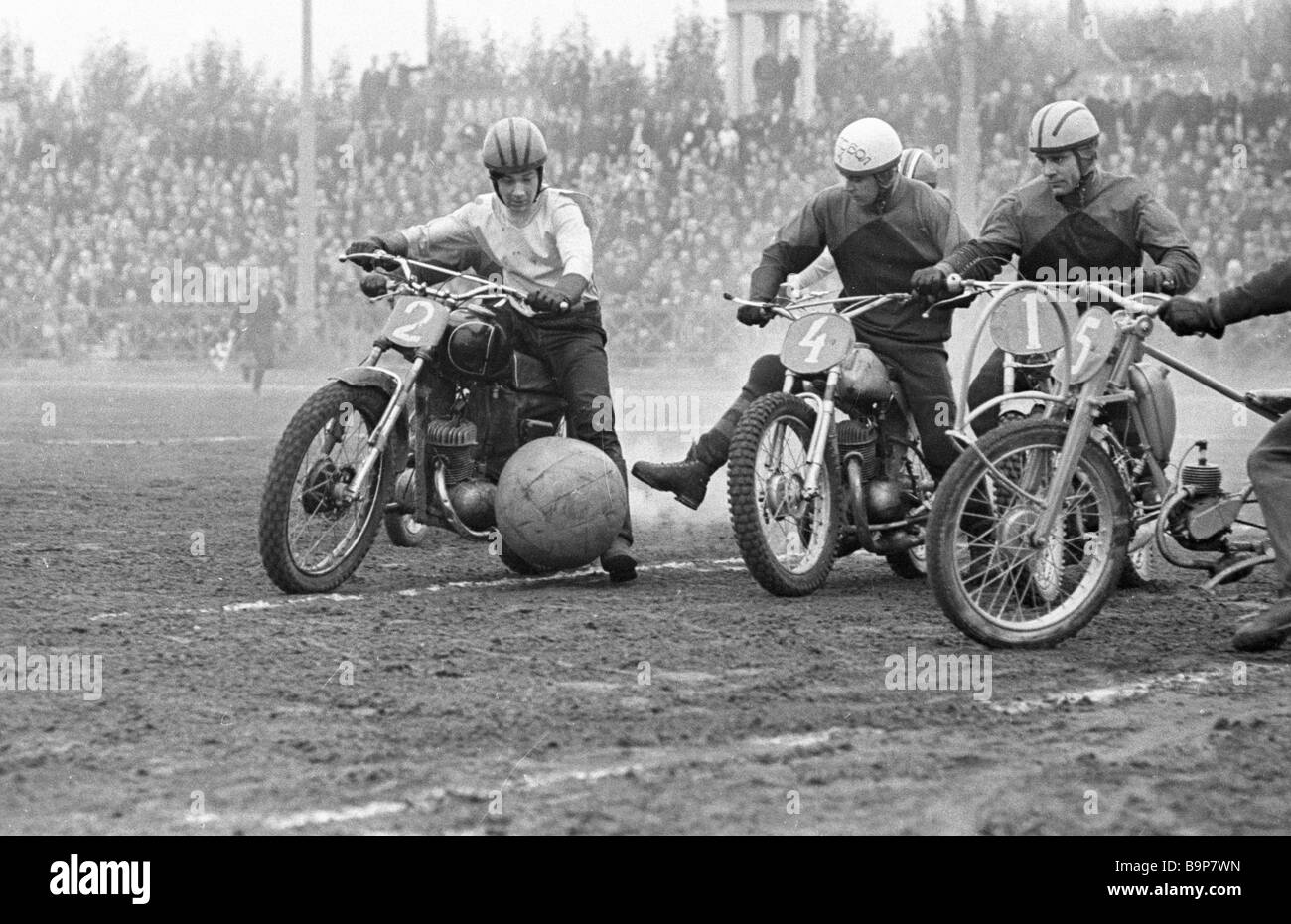 Motorcyclists play motorball Stock Photo - Alamy