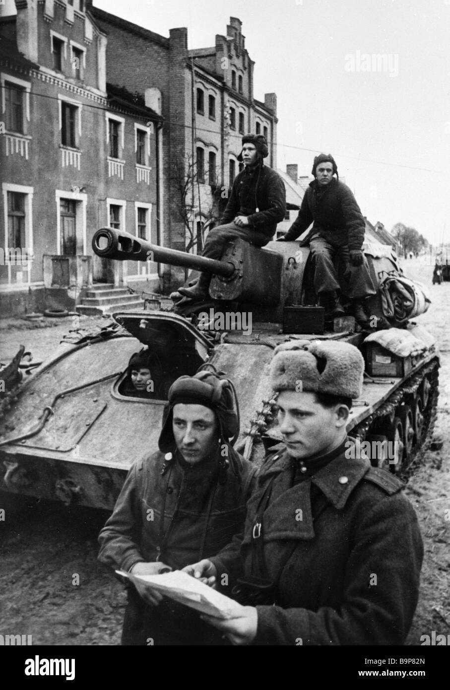 Lieutenant V. Lobachev, right, setting a combat task to Junior ...