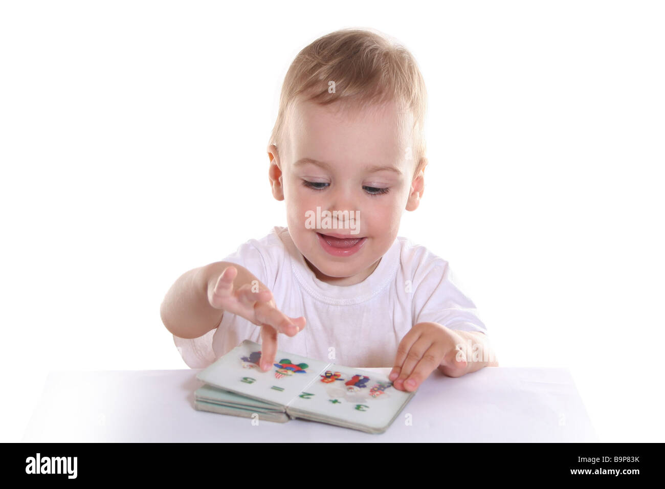baby with book Stock Photo - Alamy