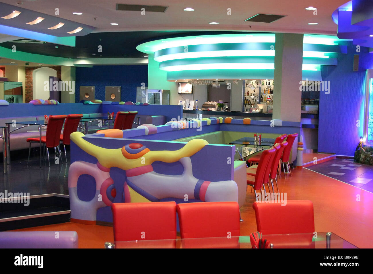 Colourful cafe interior tables chairs hi-res stock photography and ...