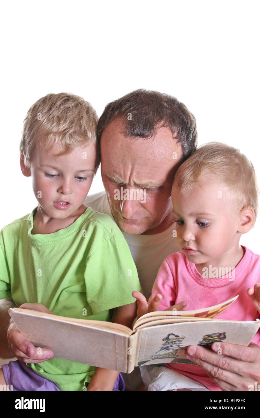 grandfather read book with children Stock Photo - Alamy