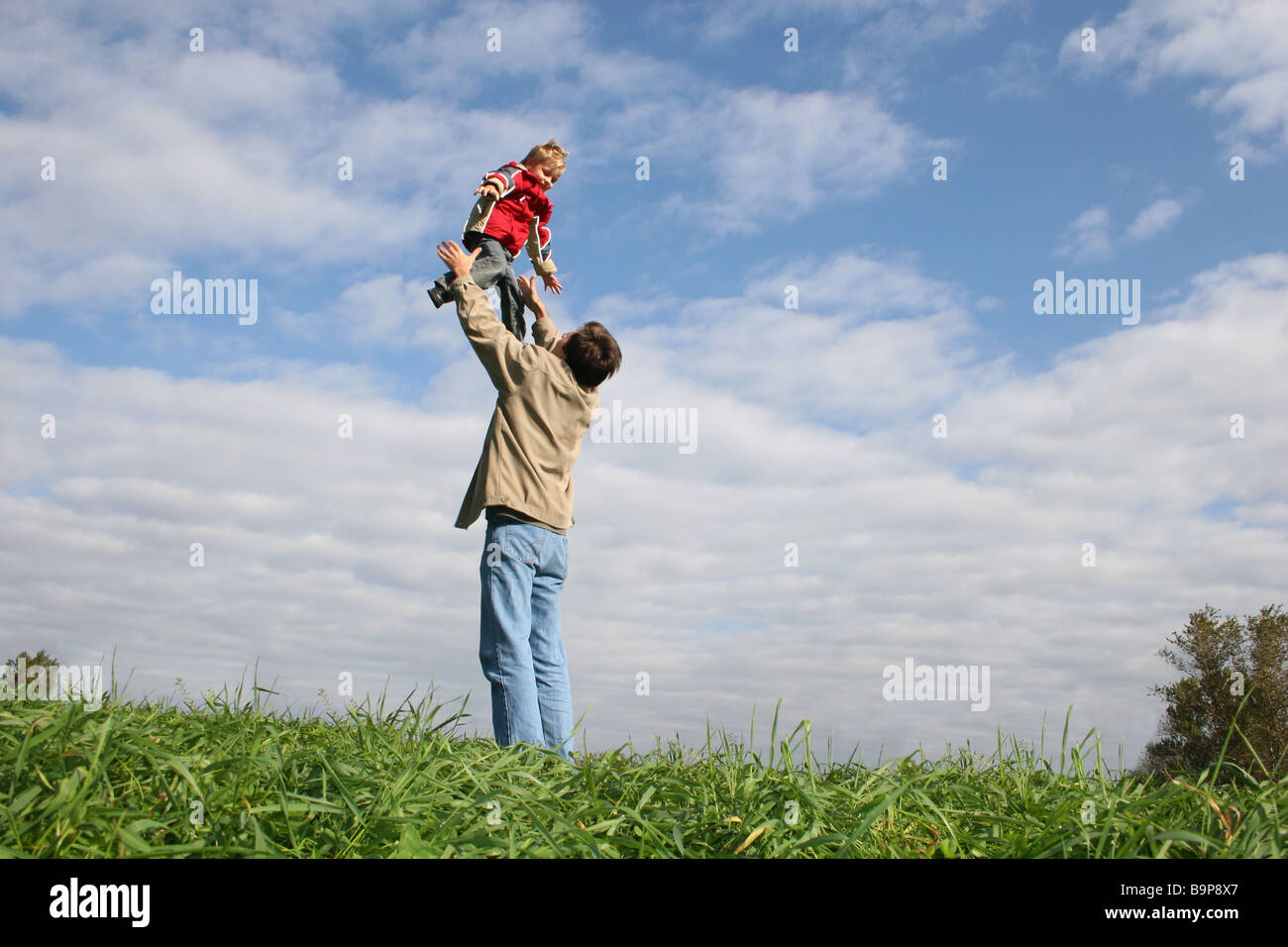 fly child on father's hands Stock Photo - Alamy