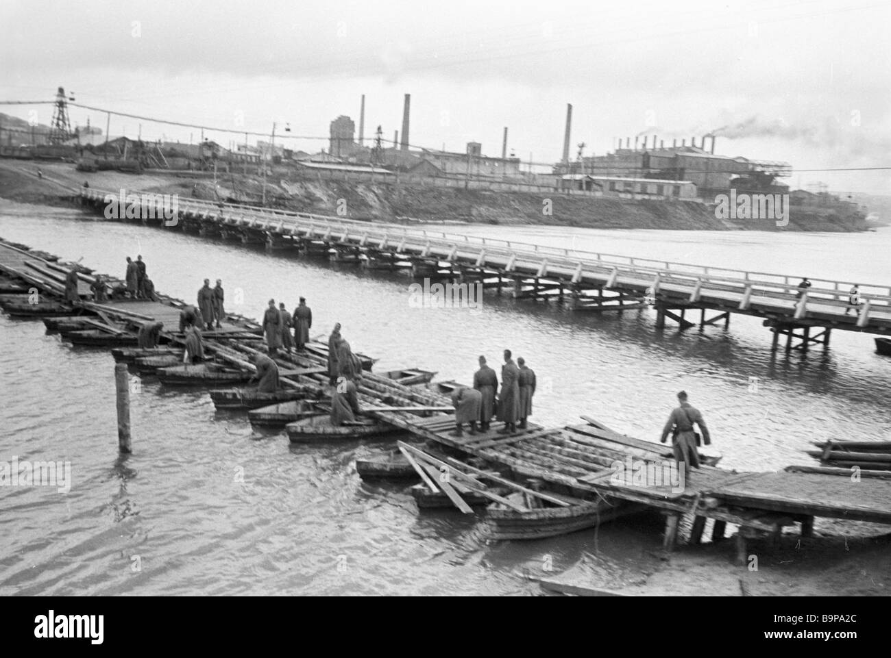 Soviet combat engineers building bridges across the Seversky Donest ...